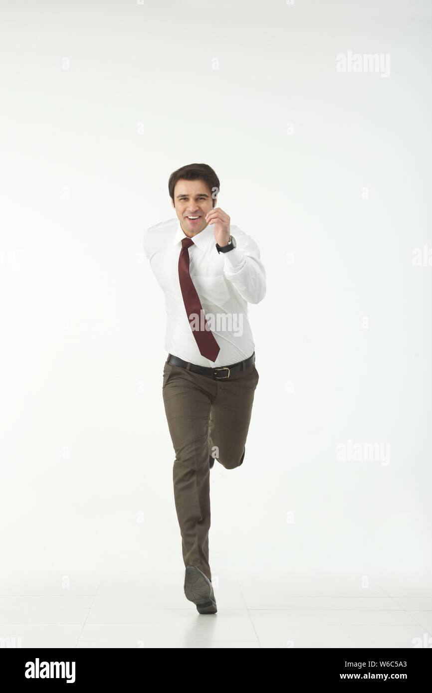 Indian businessman running hi-res stock photography and images - Alamy