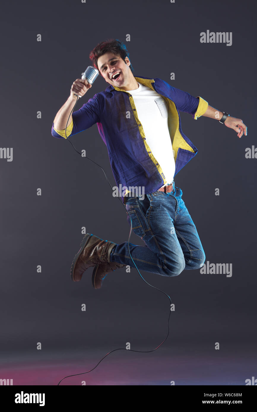 Singer jumping hi-res stock photography and images - Alamy