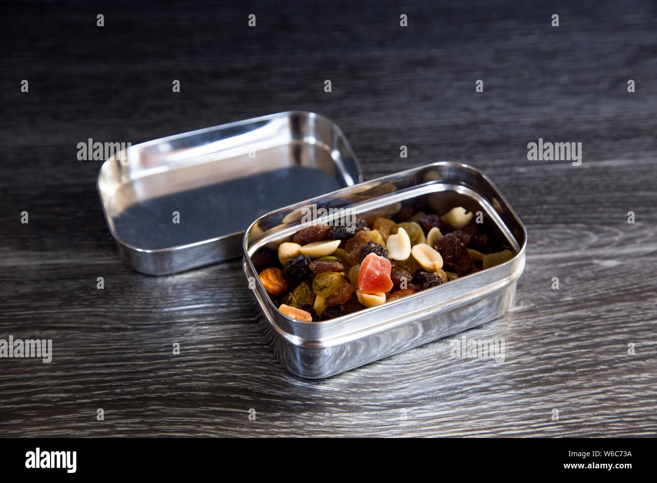 Trail mix inside a stainless steel snack box. Plastic alternative ...