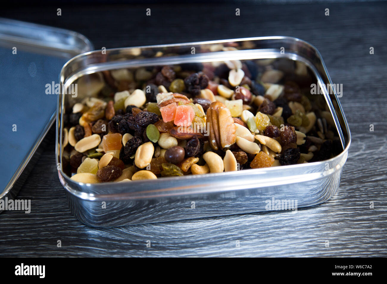 Trail mix inside a stainless steel snack box. Plastic alternative ...