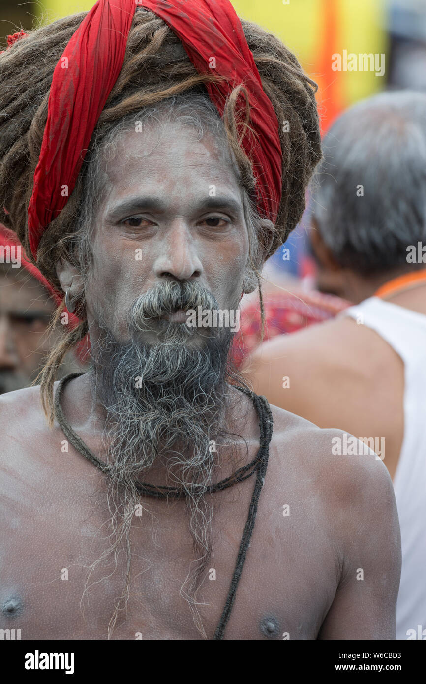 Portrait of a naga Sadhu with very long Hair during Kumbh Mela at ...