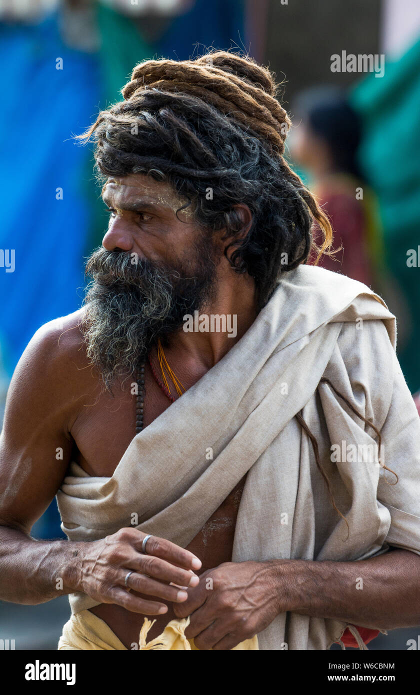 Portrait of a naga Sadhu with very long Hair during Kumbh Mela at ...
