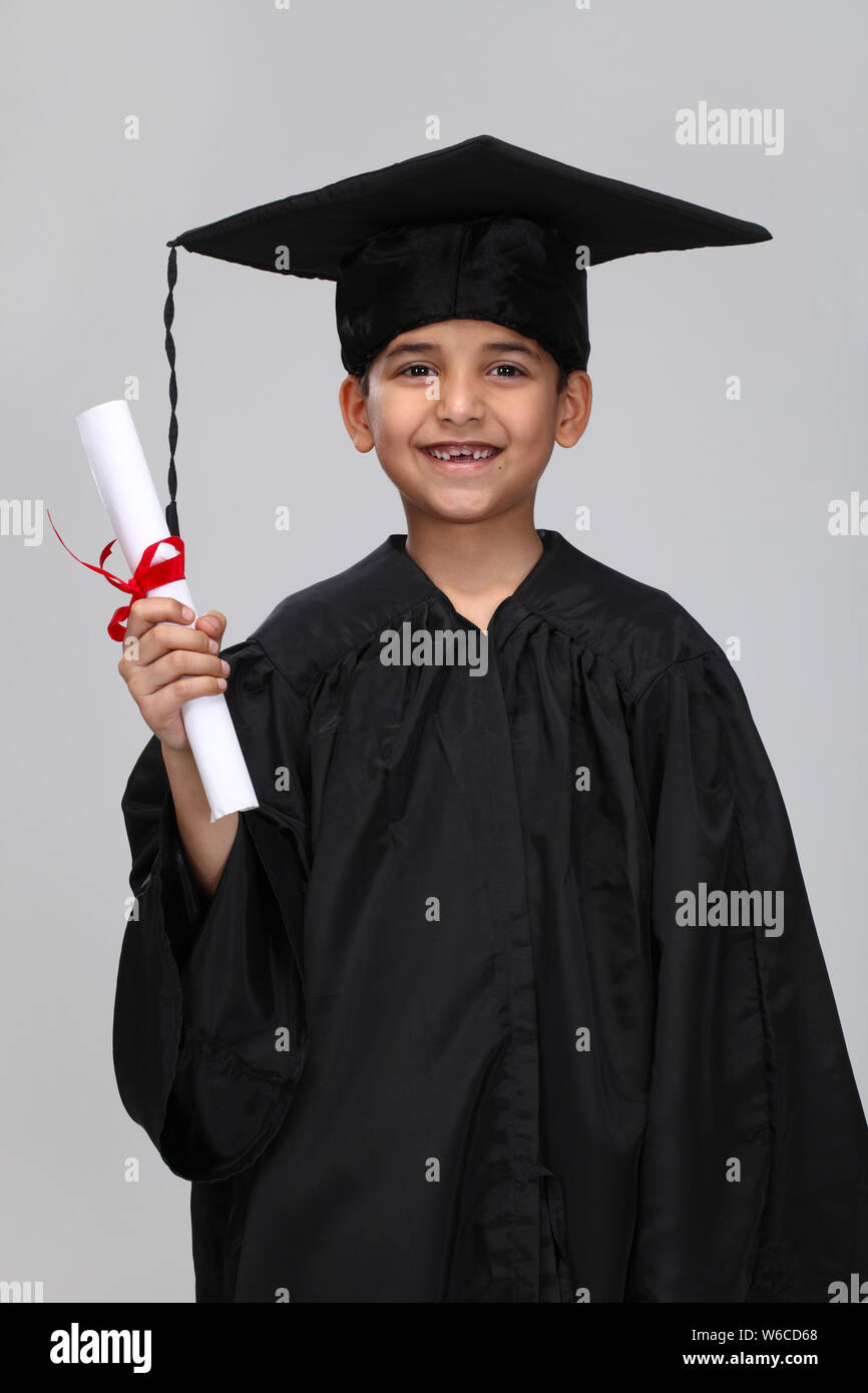 Boy celebrating graduation degree Stock Photo - Alamy