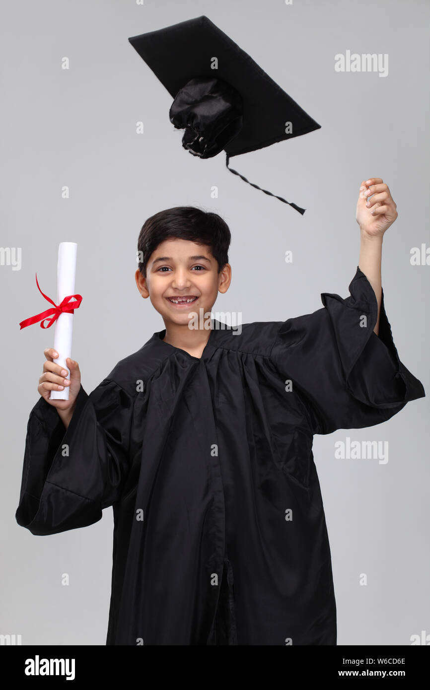Boy celebrating graduation degree Stock Photo - Alamy