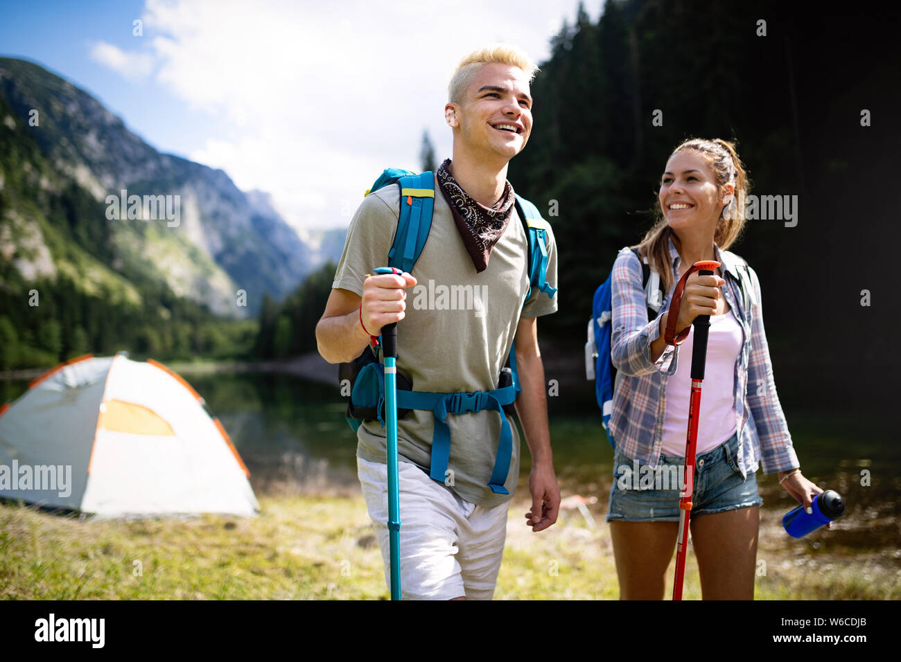 Young friends camping in the wilderness hi-res stock photography and ...