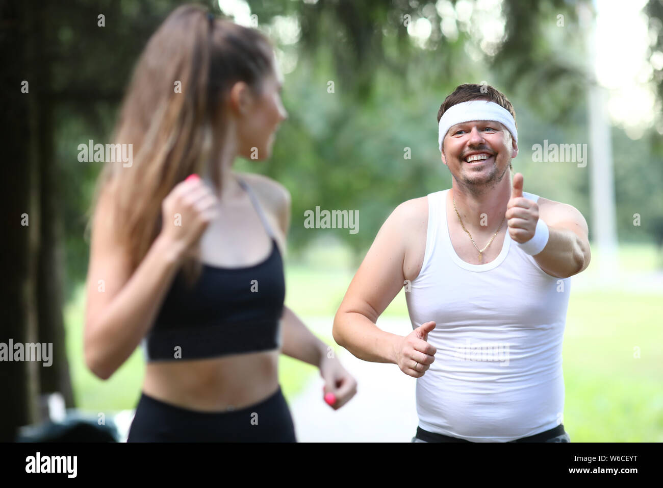 Overweight man running hi-res stock photography and images - Alamy
