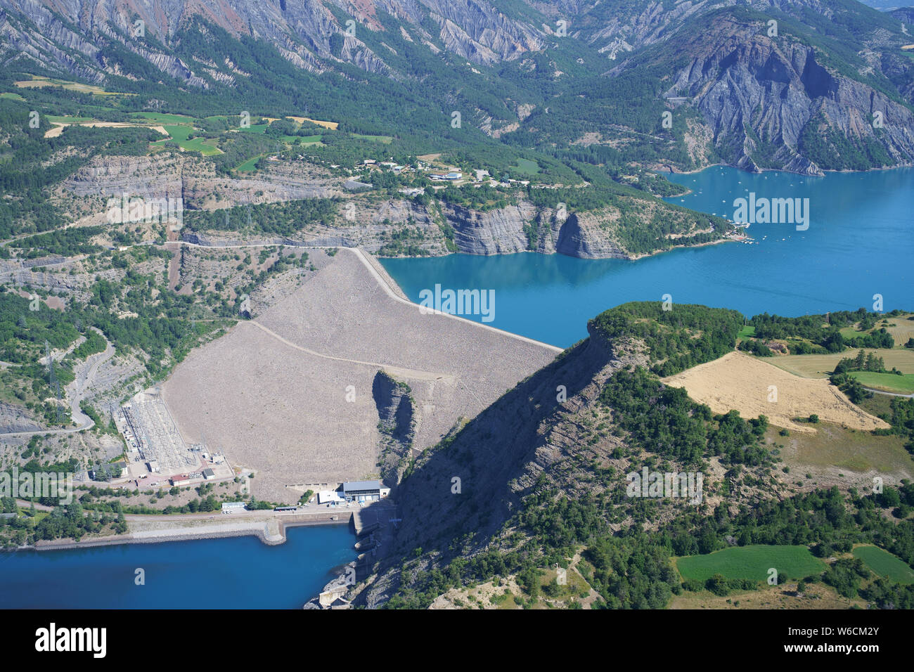 AERIAL VIEW. Dam of Lake Serre-Ponçon: a water storage from the Durance ...
