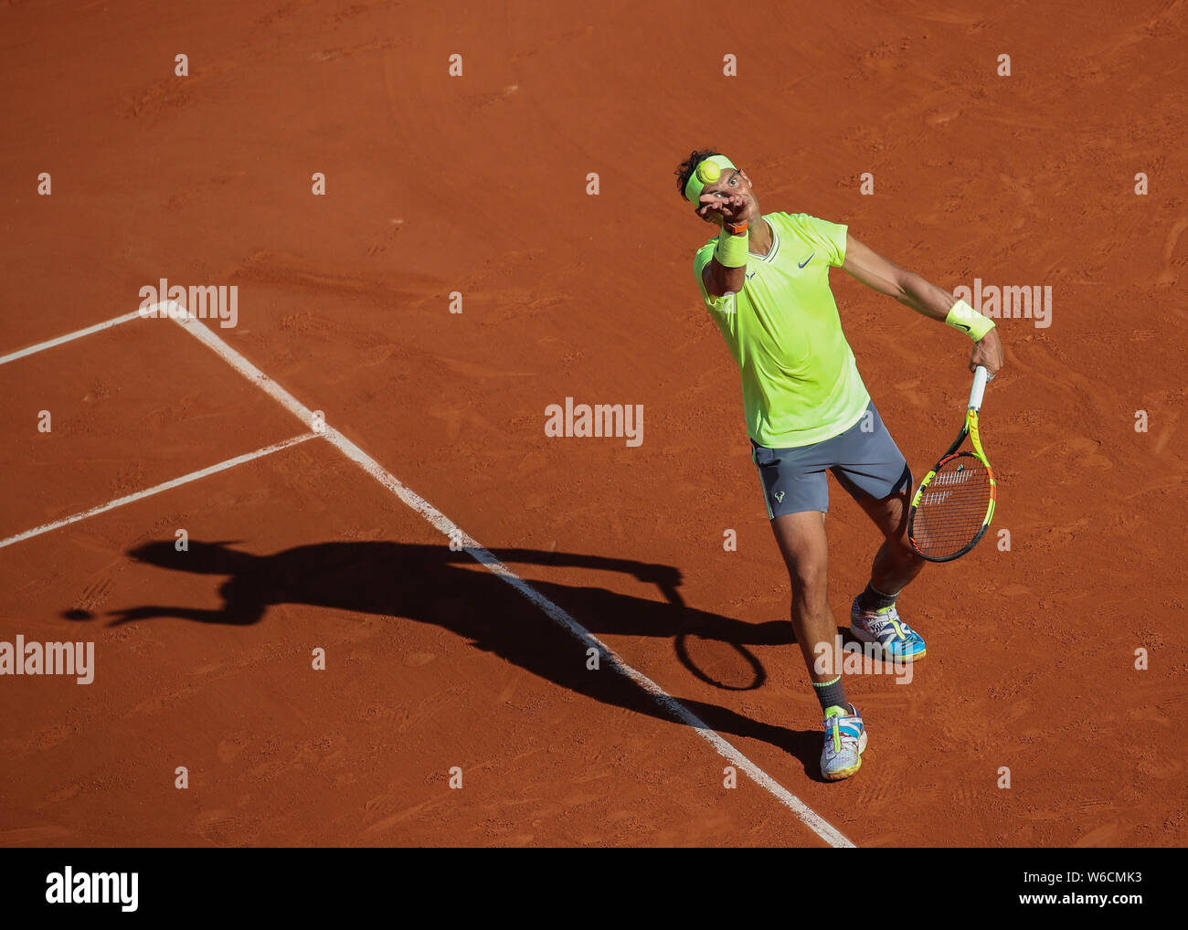 Spanish tennis player Rafael Nadal playing a service shot in French ...