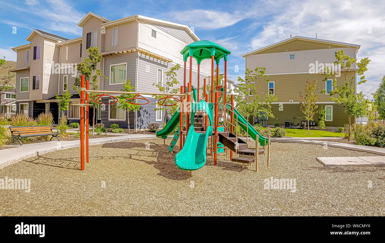 Panorama frame Playground surrounded by a circular pathway and benches ...