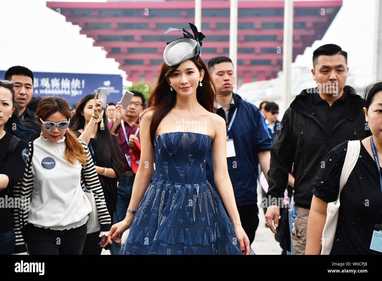 Taiwanese model and actress Lin Chi-ling, center, attends a promotional ...