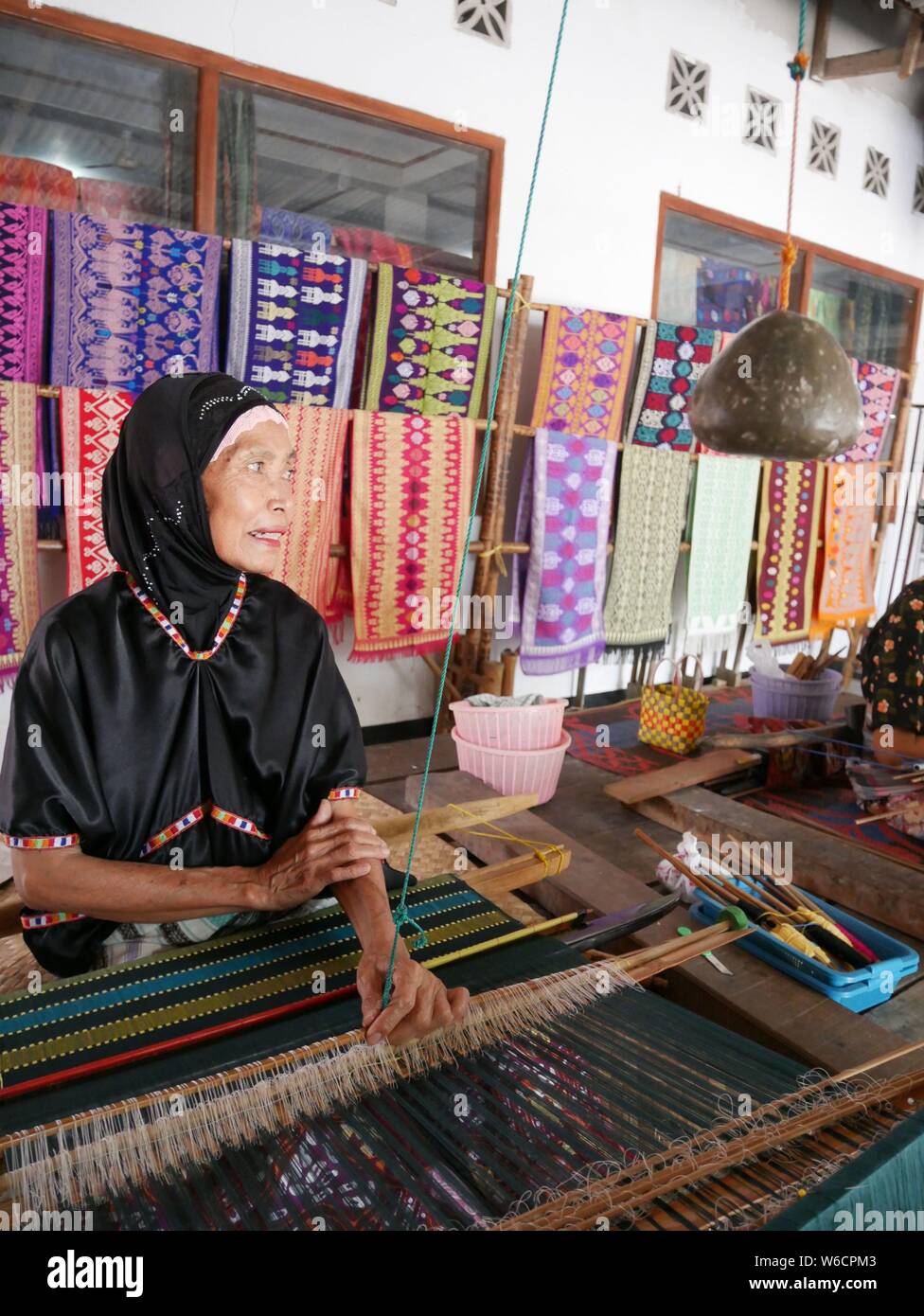 Indigenous woman weaving cloth hi-res stock photography and images - Alamy