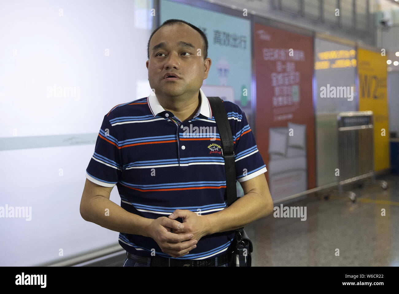 Chinese doctor Tan Qindong who was detained for three months for ...