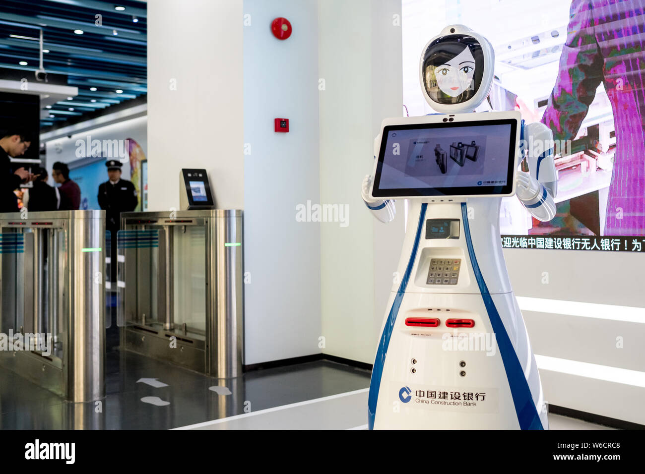 A robot that serves as bank lobby manager in the Chinese mainland's ...