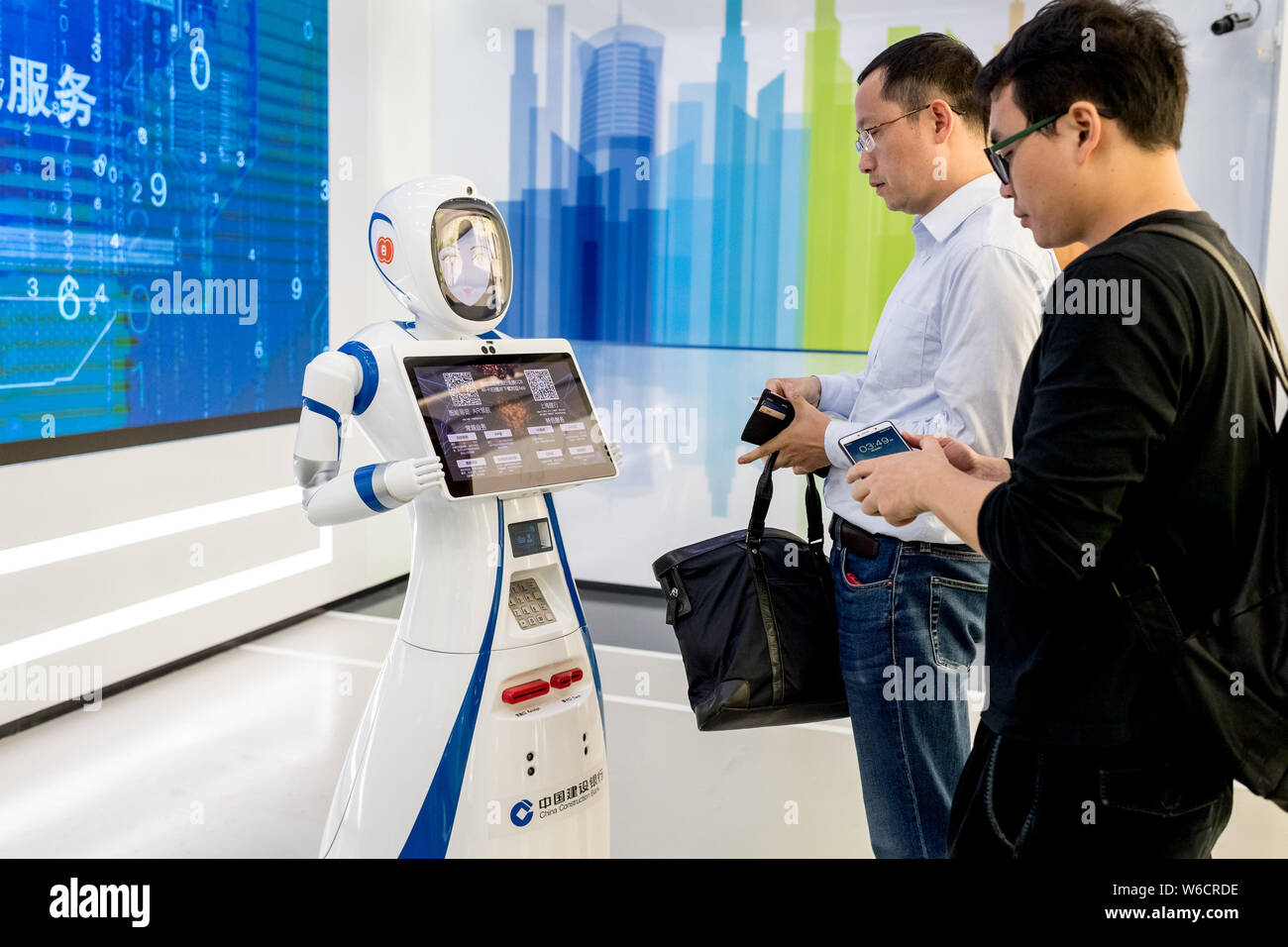 A robot that serves as bank lobby manager in the Chinese mainland's ...