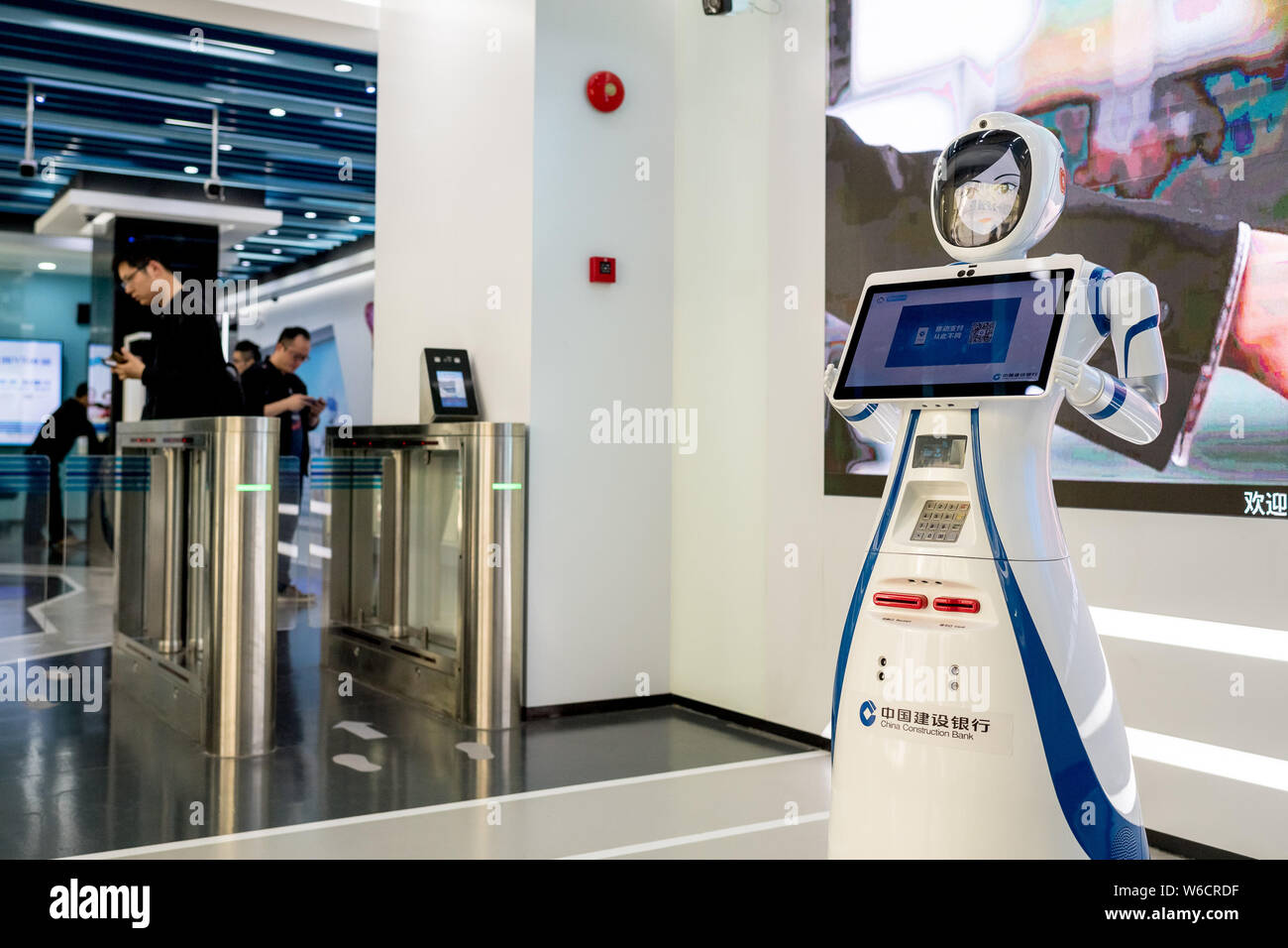 A robot that serves as bank lobby manager in the Chinese mainland's ...
