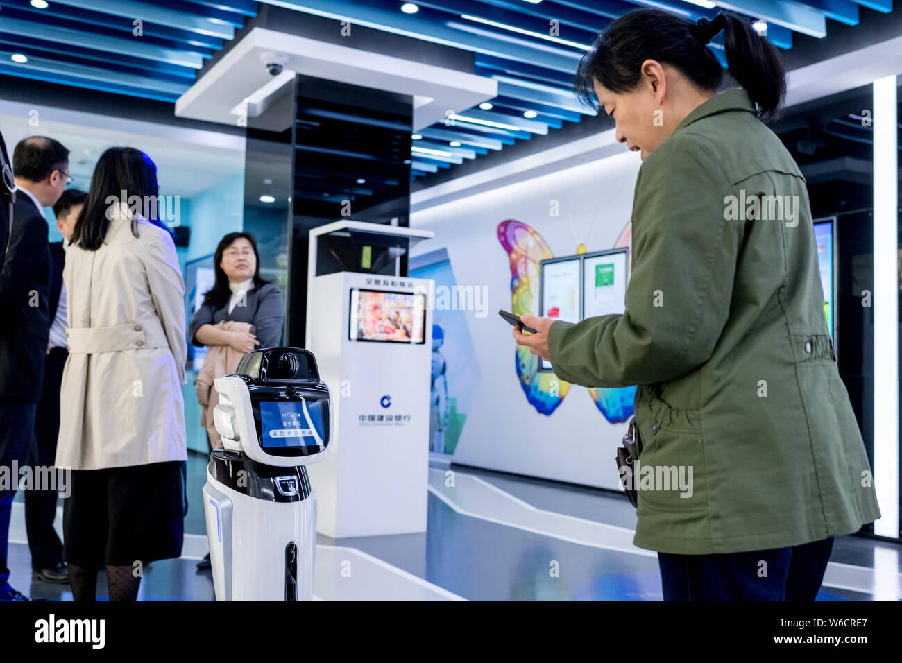 A robot that serves as bank lobby manager in the Chinese mainland's ...