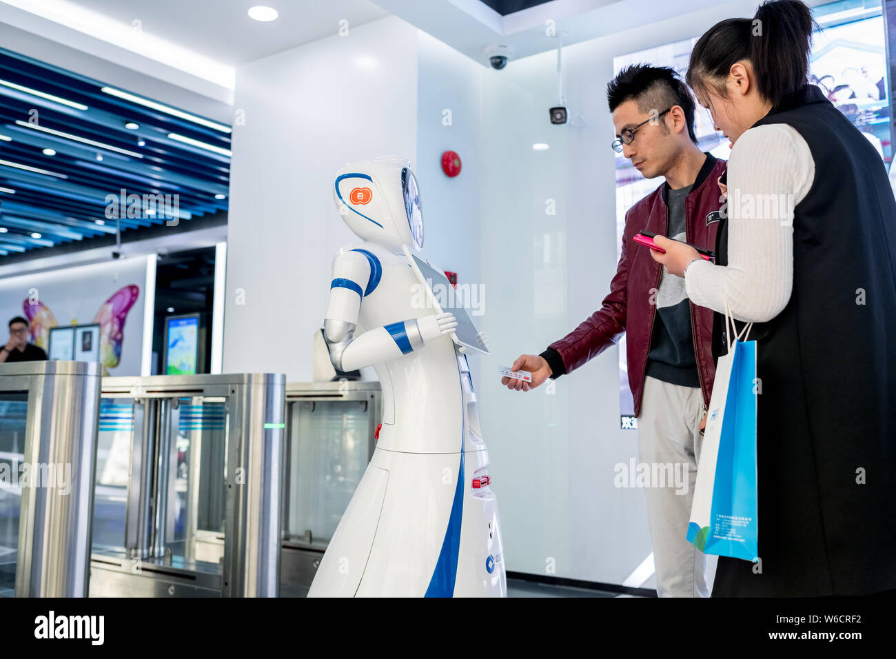 A robot that serves as bank lobby manager in the Chinese mainland's ...