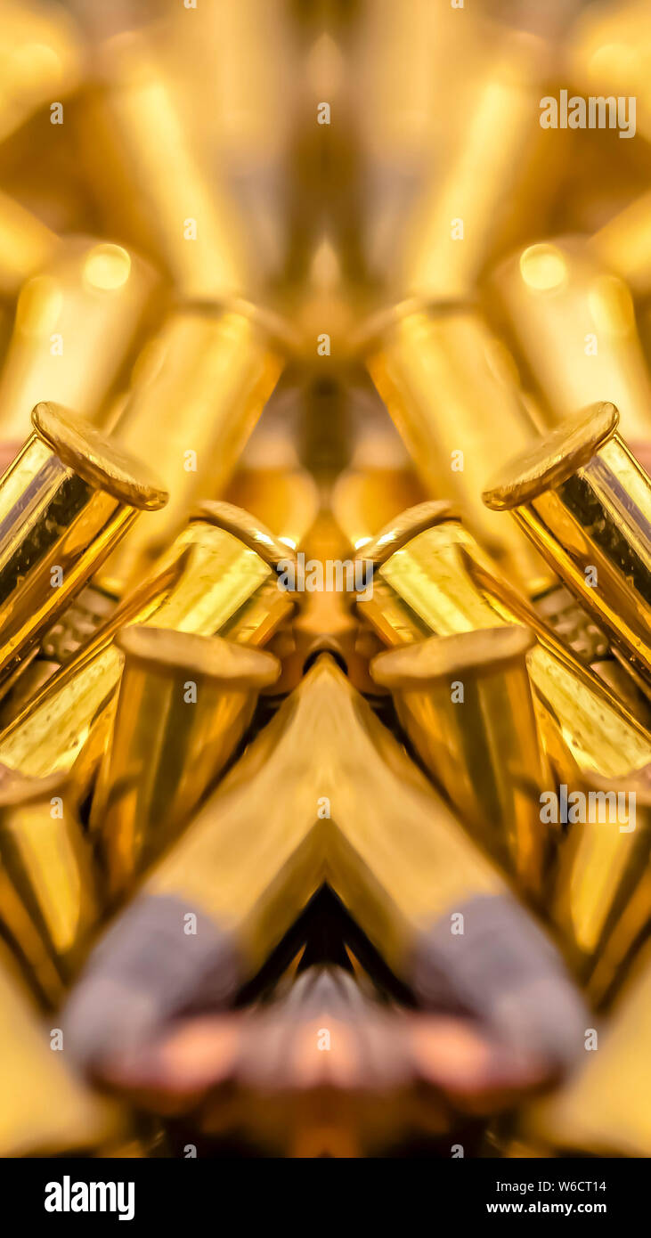 Vertical frame Pile of shiny bullets on an axis of symmetry Stock Photo ...