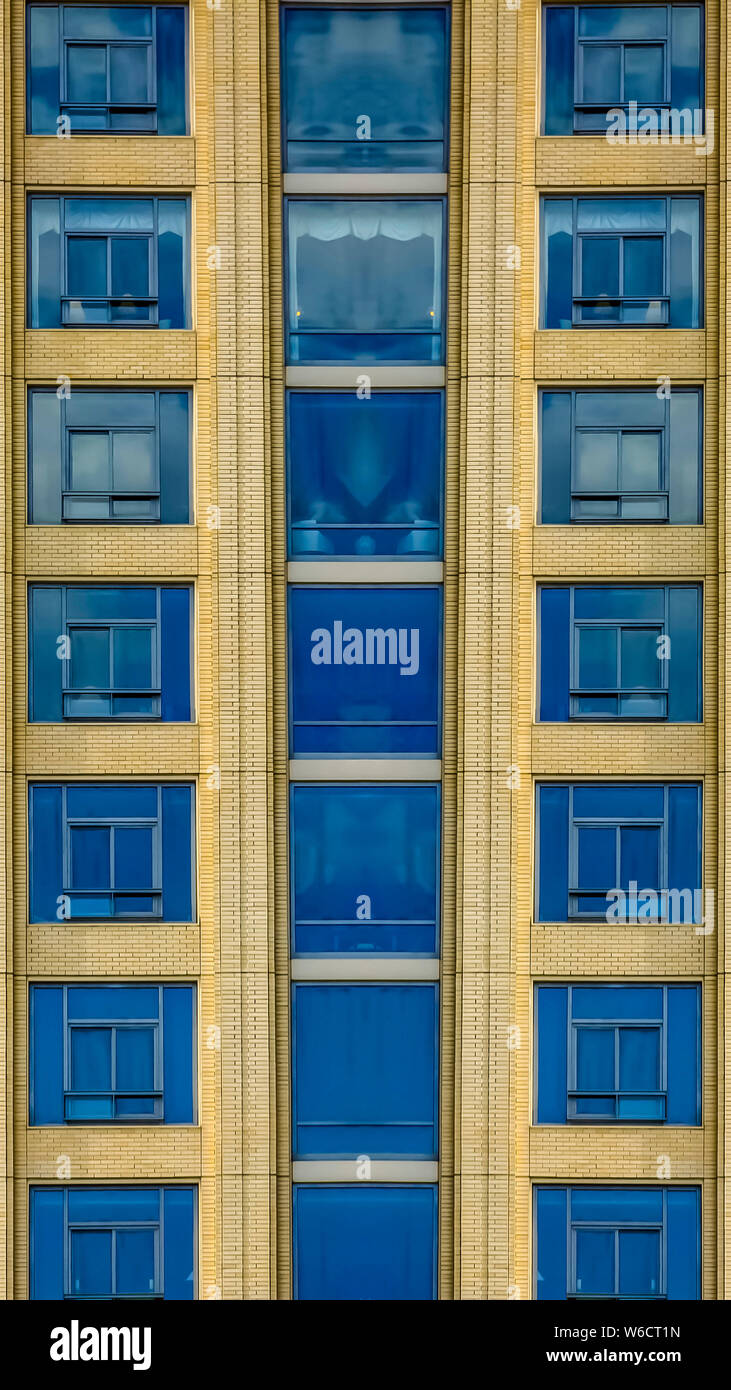 Vertical frame Close up of windows and decks of apartment Stock Photo ...