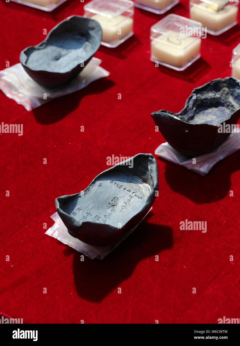 Silver ingots unearthed from the sunken boats owned by peasant leader ...