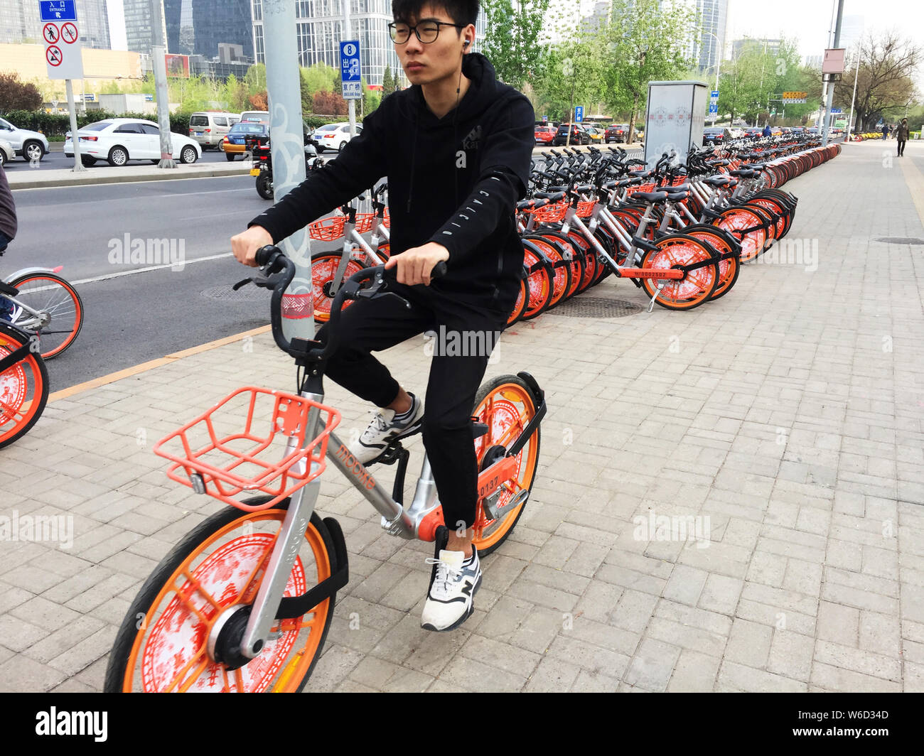A local resident rides a China-themed bicycle featuring paper-cut ...