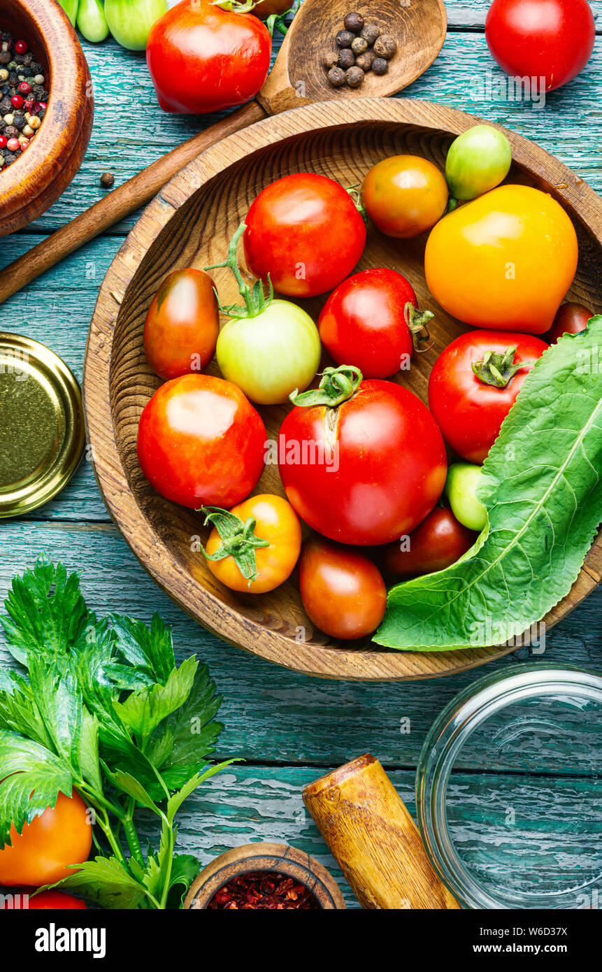 Autumn harvest of tomatoes.Canning tomatoes.Pickling of ripe tomatoes ...