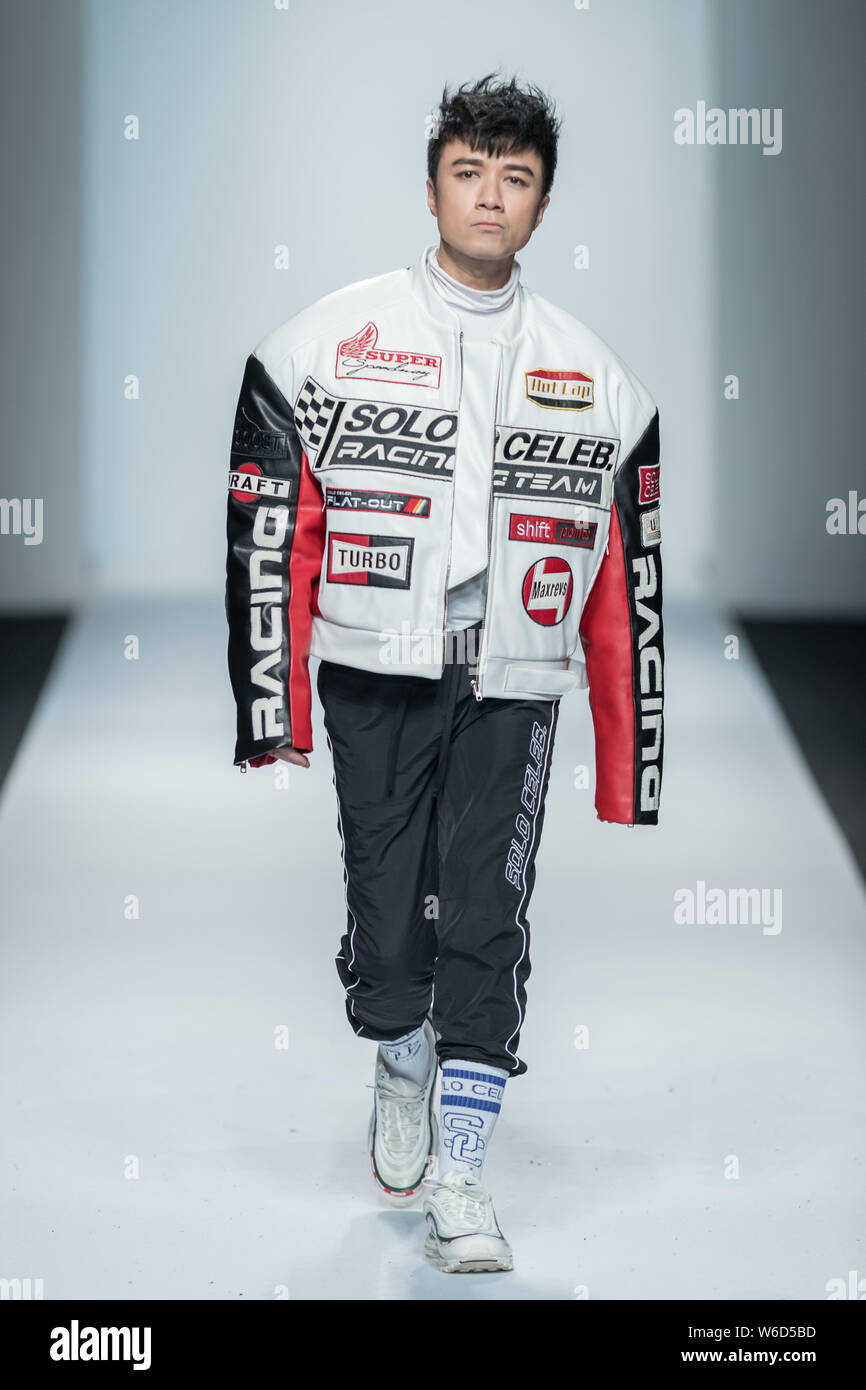 Hong Kong singer, actor and designer Leo Ku displays a new creation at ...