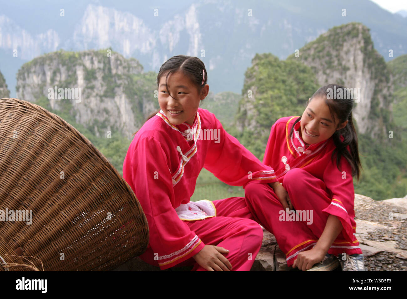 Tujia people are pictured in a mountain in the western part of central ...