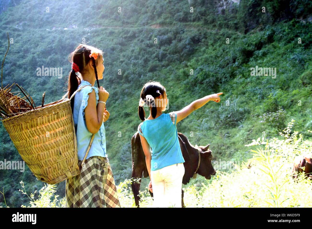 Tujia people are pictured in a mountain in the western part of central ...