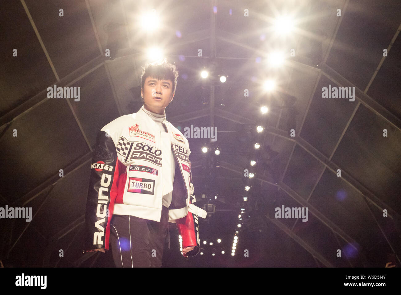Hong Kong singer, actor and designer Leo Ku displays a new creation at ...
