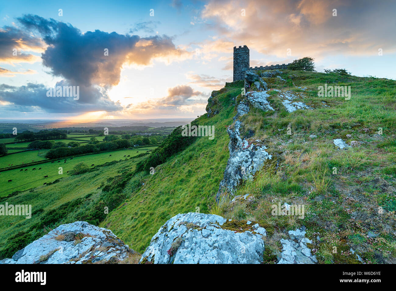 Sunset over Brentor on the edge of Dartmoor National park in Devon ...