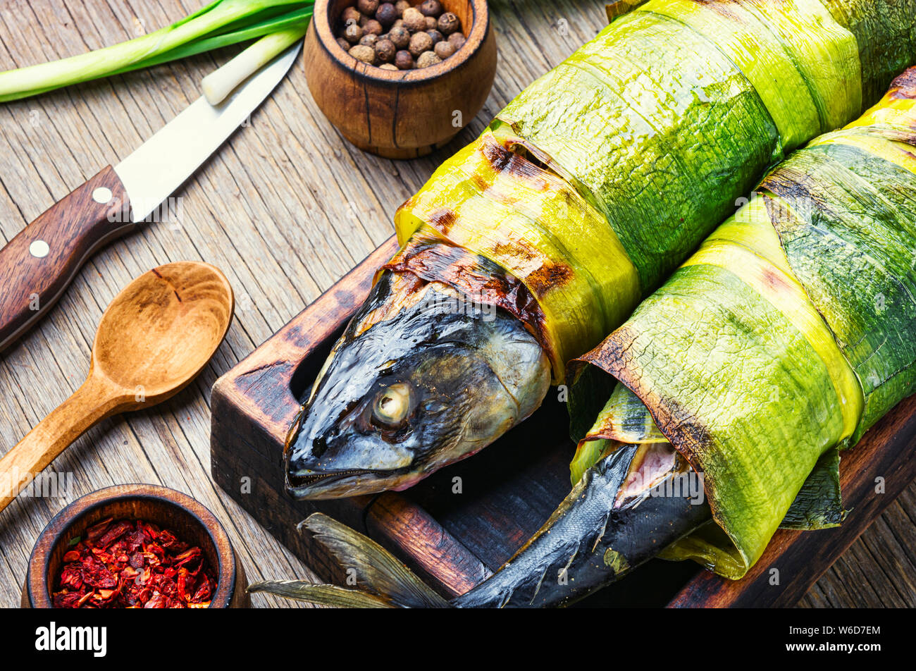 Baked mackerel stuffed with berries.Fish with currant filling.Seafood ...