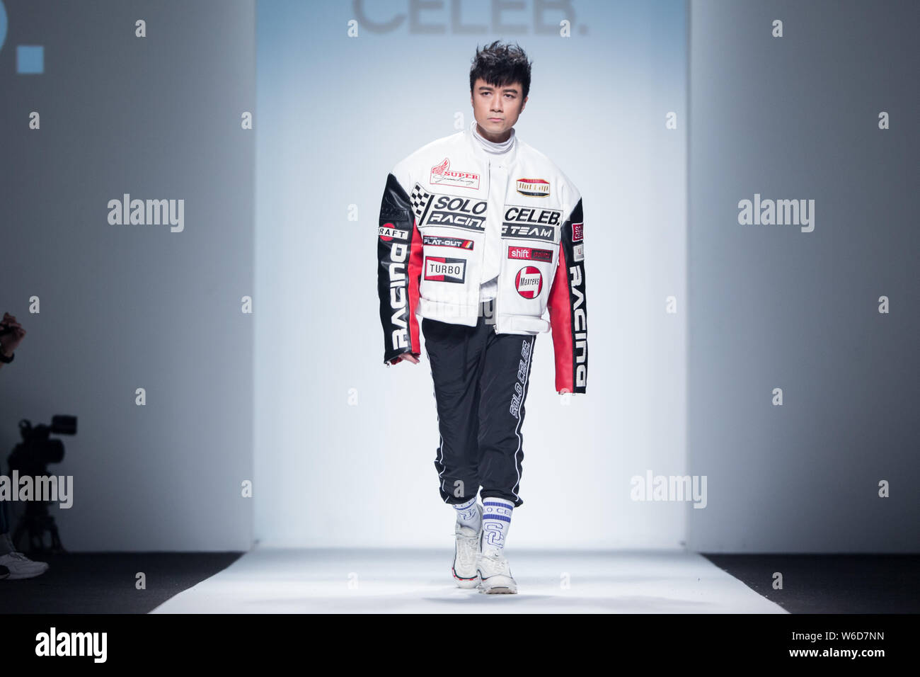Hong Kong singer, actor and designer Leo Ku displays a new creation at ...