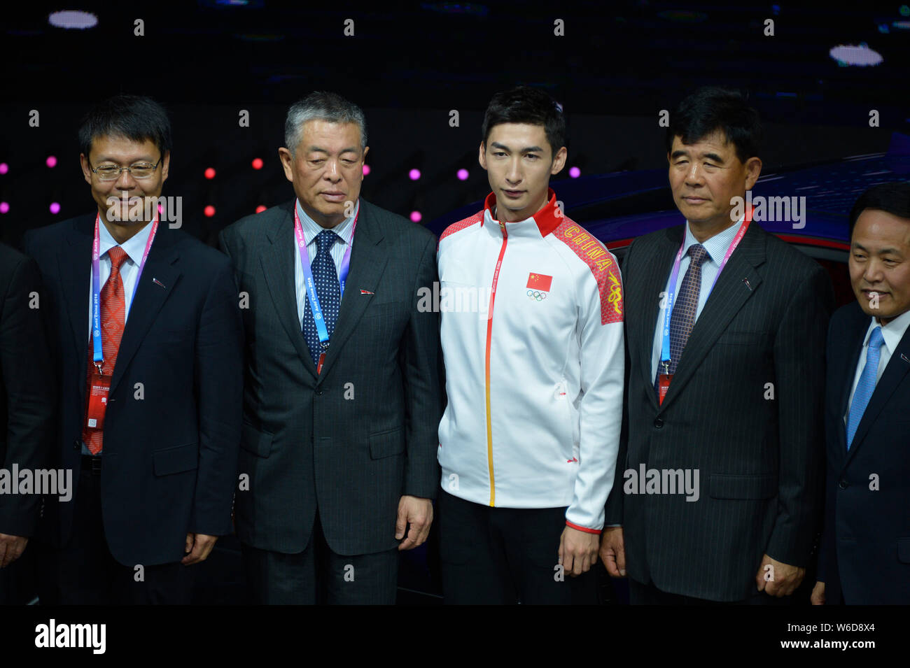 Chinese short track speed skater Wu Dajing, center, the winner of the ...