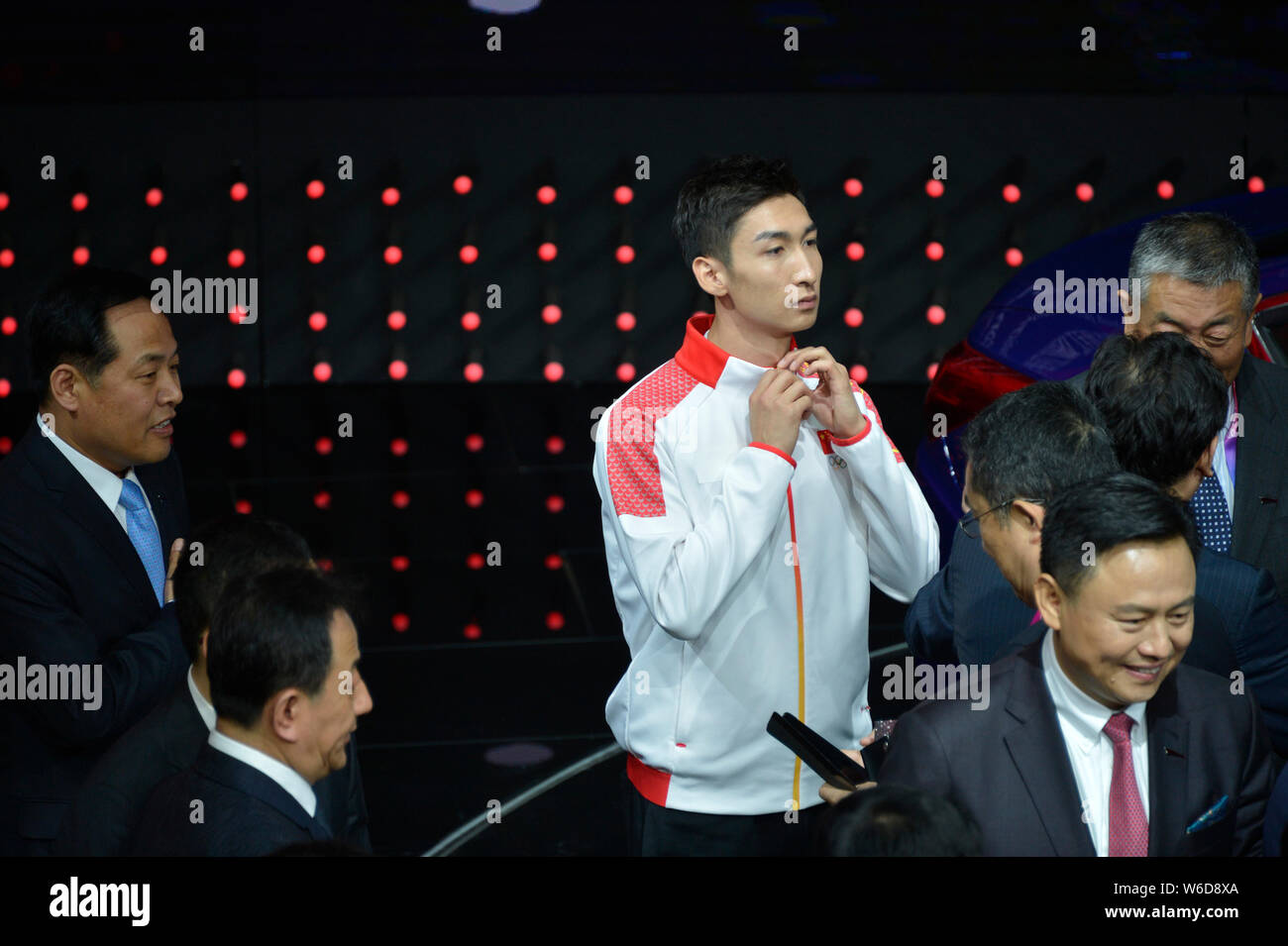 Chinese short track speed skater Wu Dajing, center, the winner of the ...