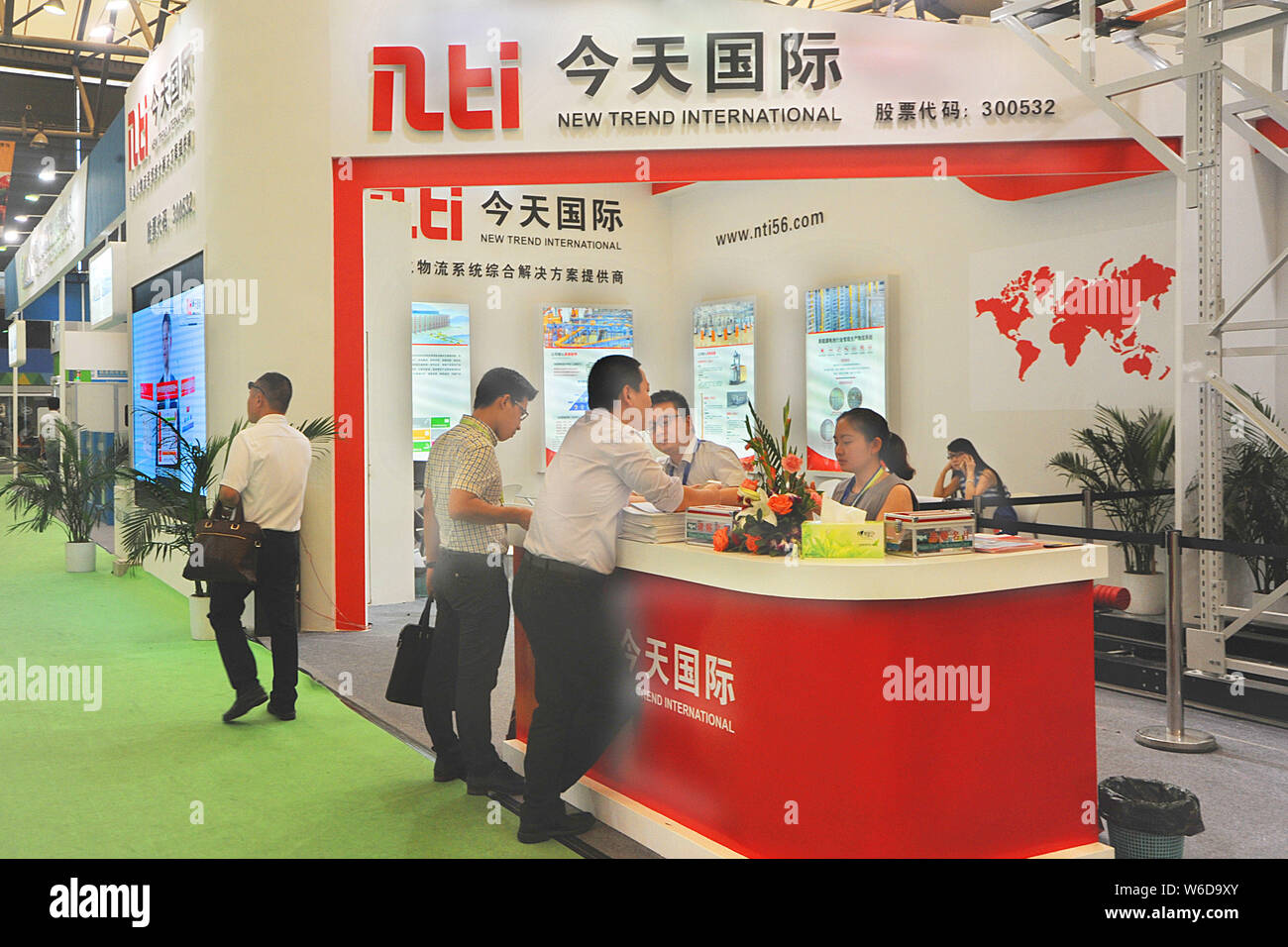 --FILE--People visit the stand of New Trend International Logis-Tech Co ...