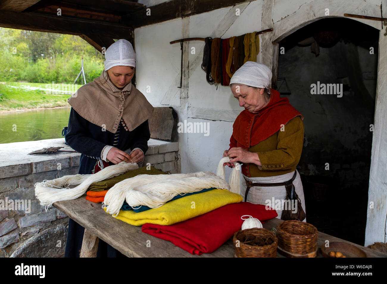 Two women working in a dye workshop at the outdoor Medieval Centre in ...