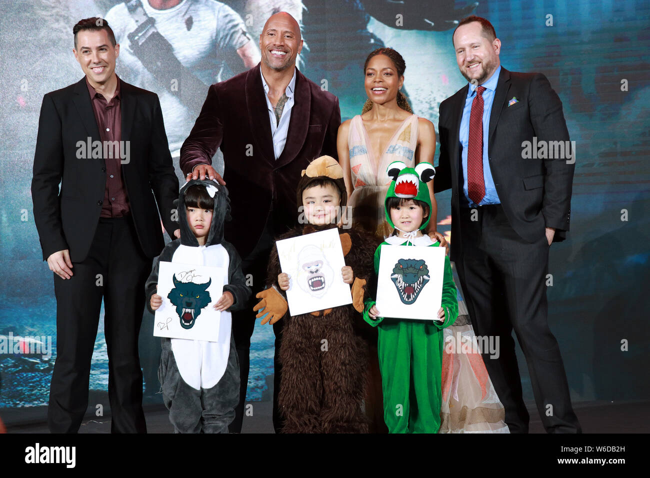(From left) American film director Brad Peyton, actor Dwayne Johnson ...