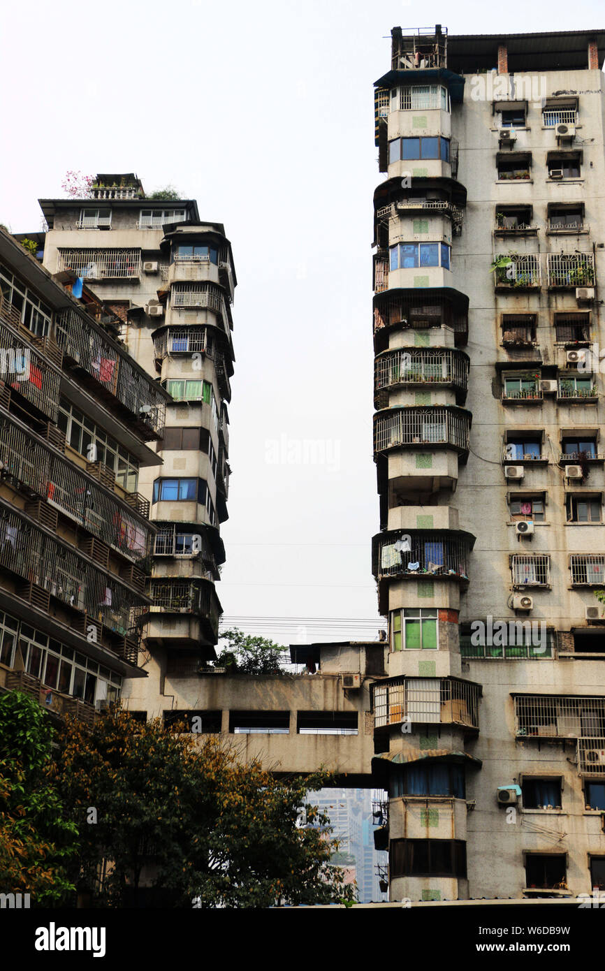 A worm's eye view of a 14-storey high corridor linking two of the six ...