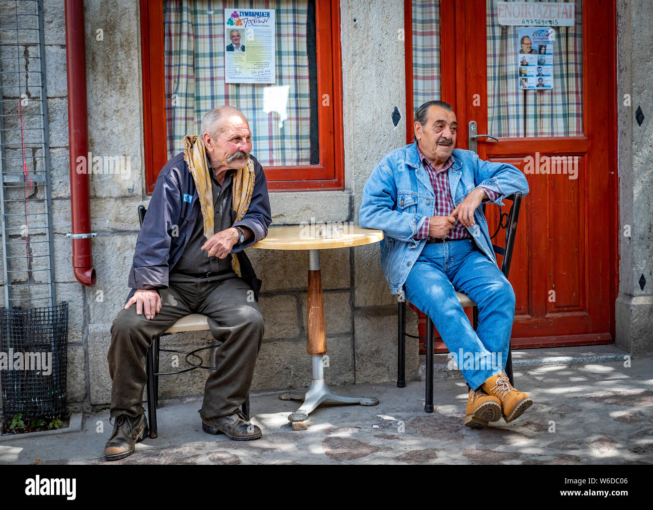 Two elderly greek men sitting hi-res stock photography and images - Alamy