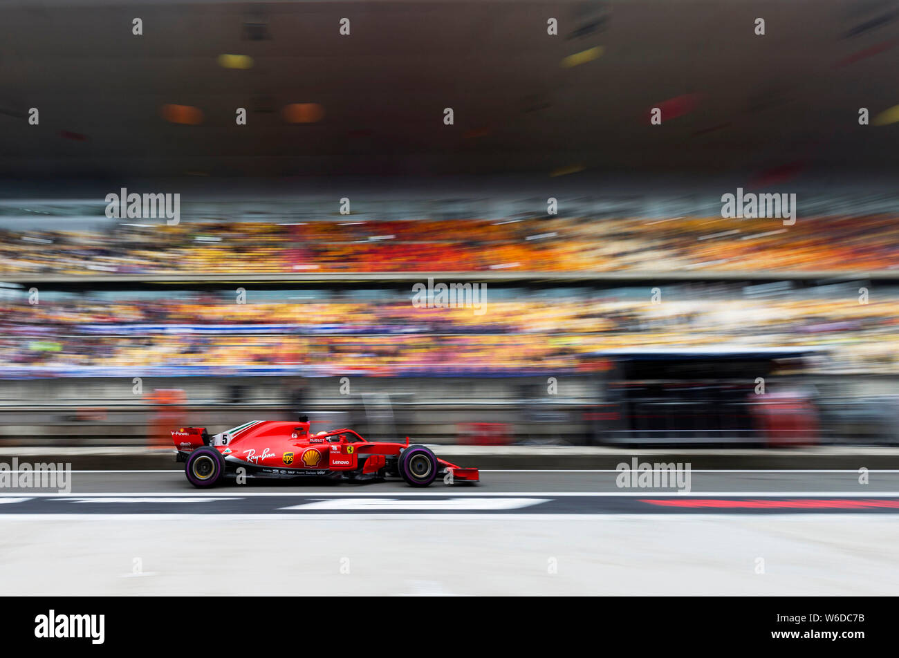 German F1 Sebastian Vettel of Ferrari steers his car during the ...