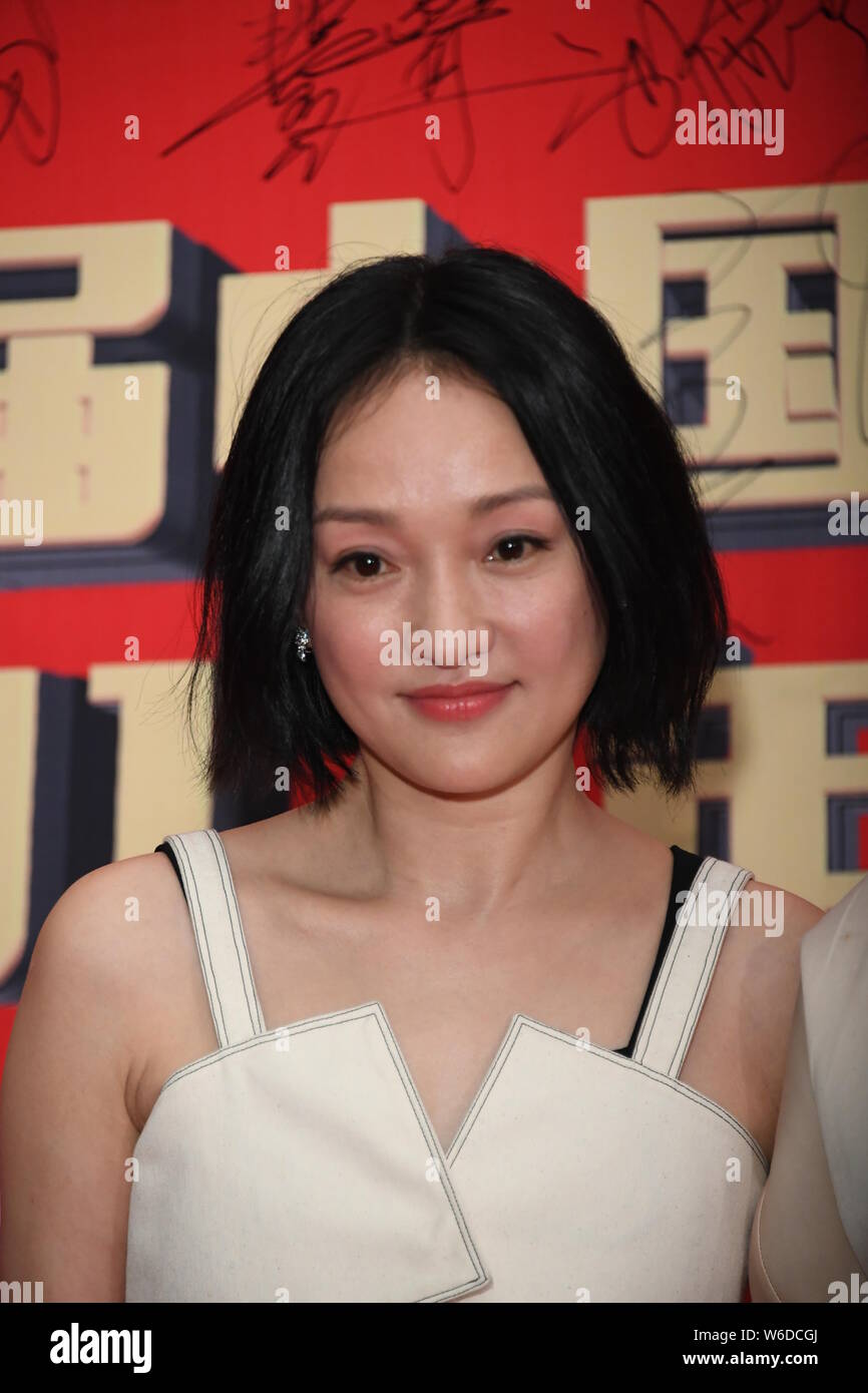 Chinese actress Zhou Xun poses as she arrives on the red carpet for 9th ...