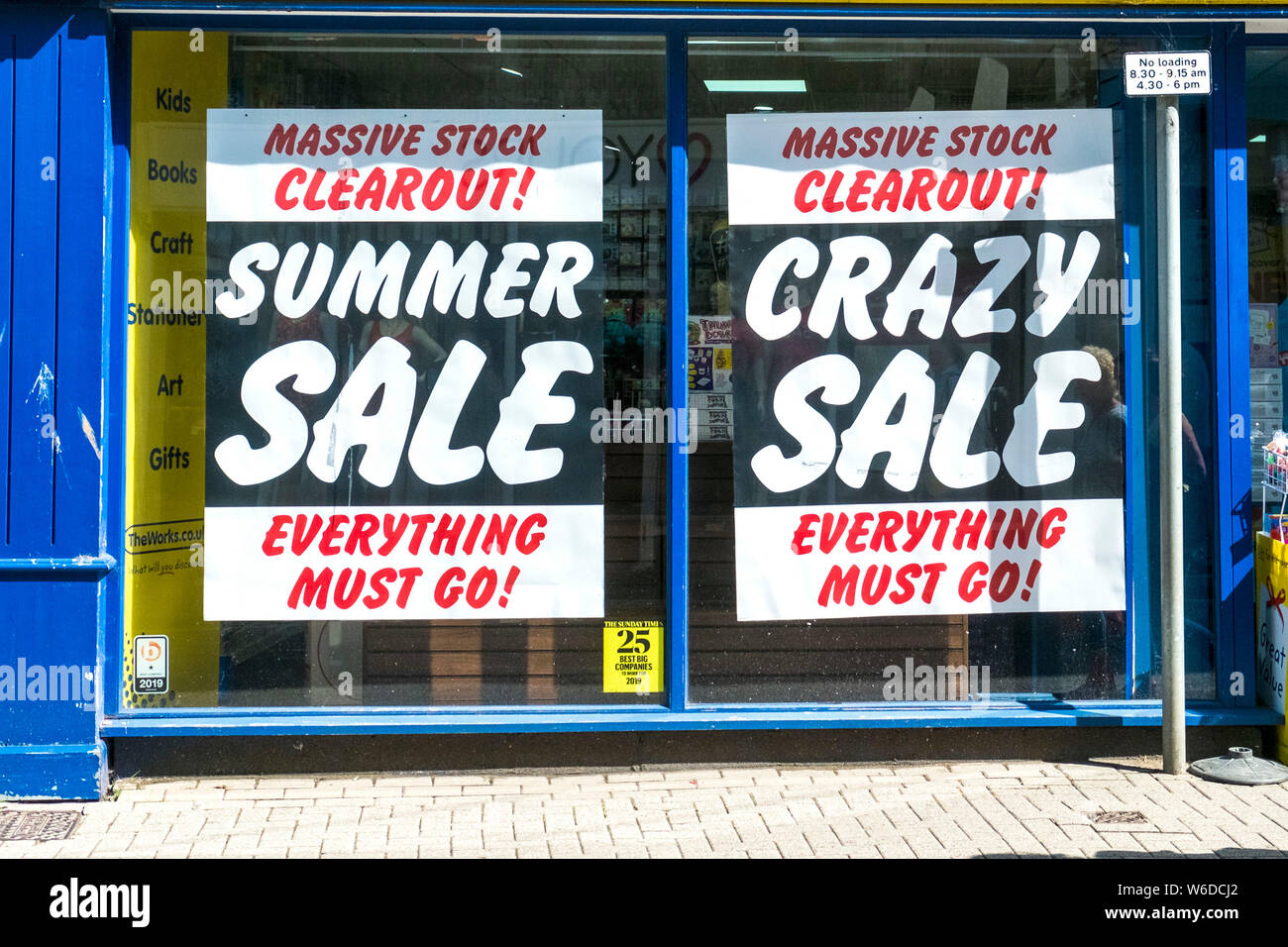 Sale signs in a shop window hi-res stock photography and images - Alamy