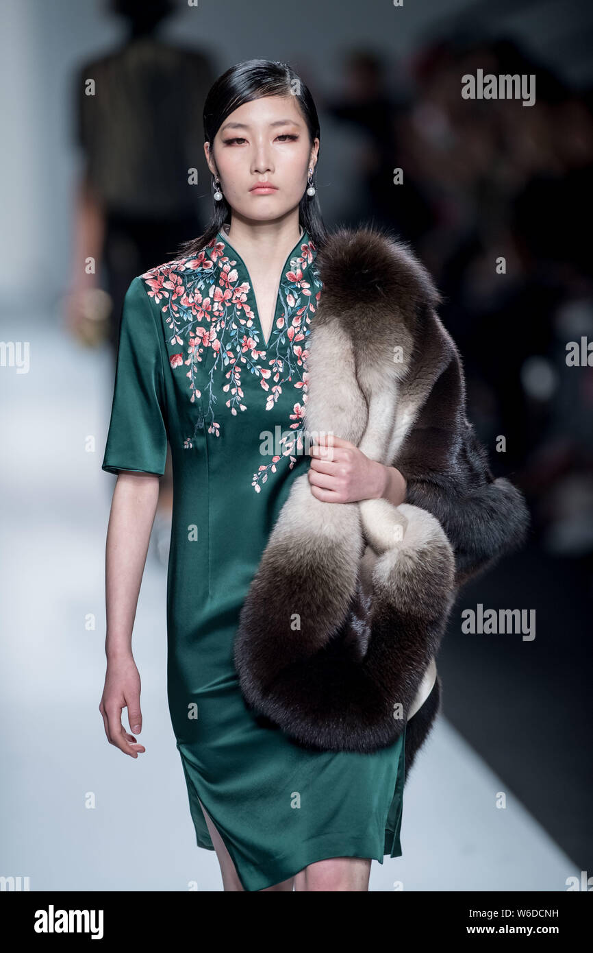 A model displays a new creation at the fashion show of LONDEE during ...