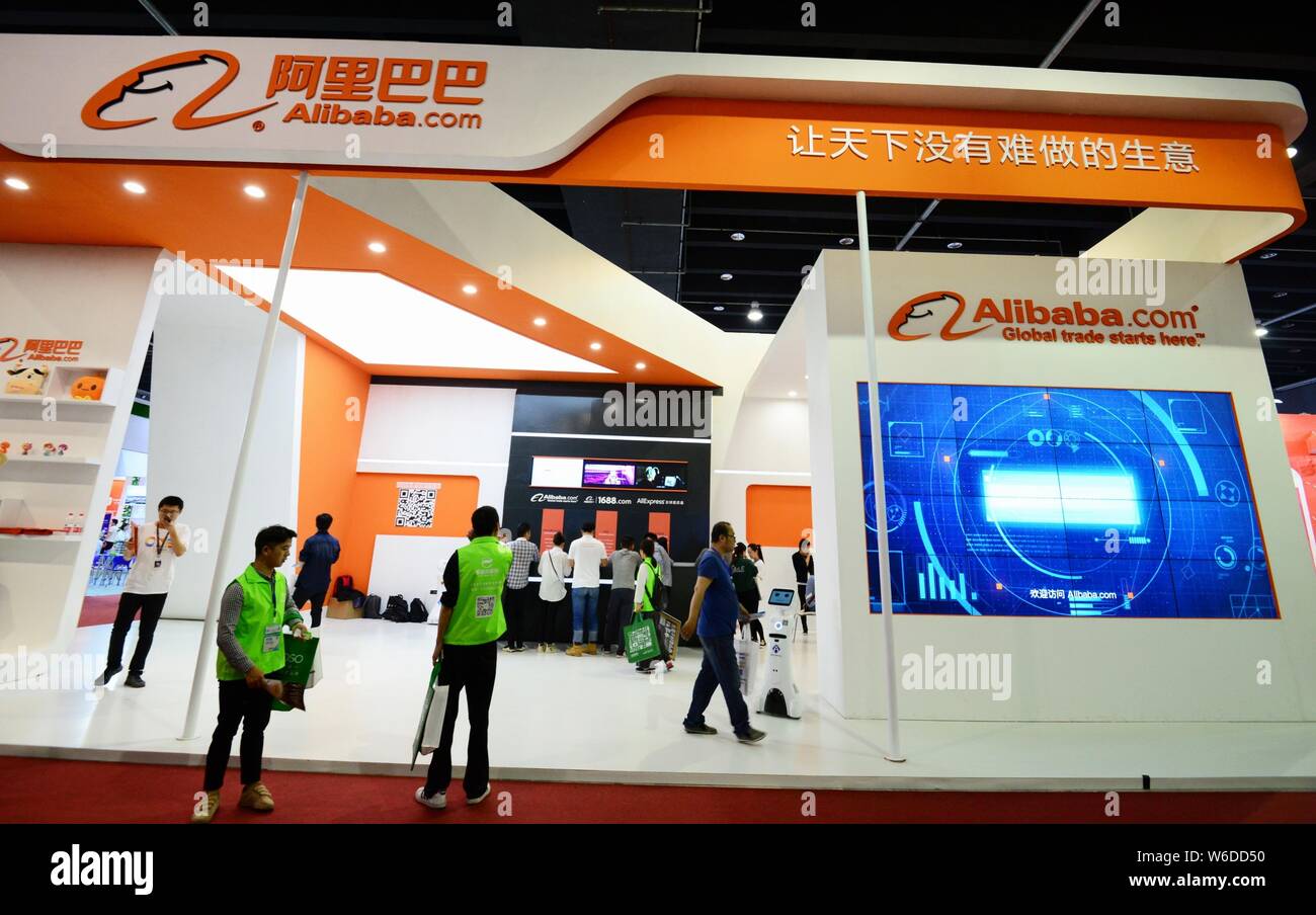 --FILE--People visit the stand of Alibaba during an exhibition in Yiwu ...