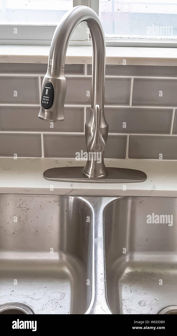 Vertical frame Double bowl stainless steel sink undermounted on the ...