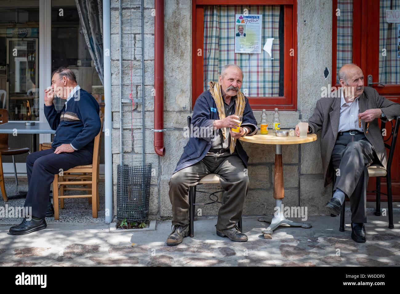 Greek men relaxing hi-res stock photography and images - Alamy