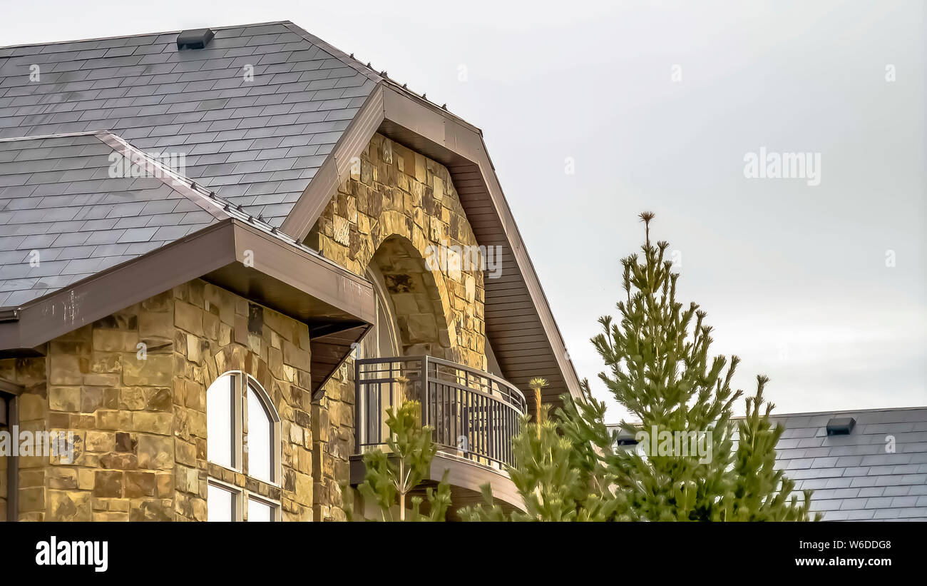 Panorama Stone home with half circle balcony and quarter round with ...