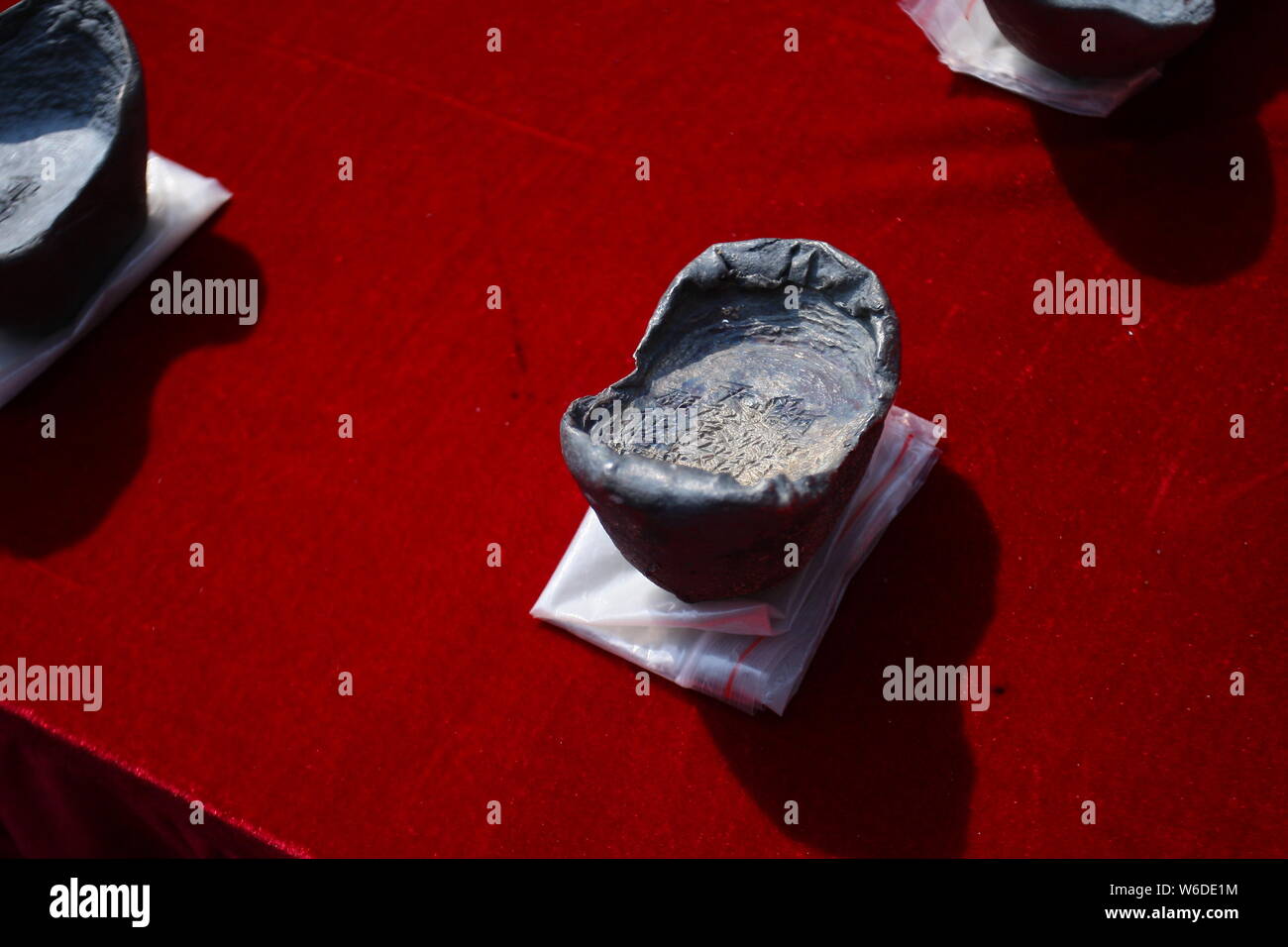 Silver ingots unearthed from the sunken boats owned by peasant leader ...