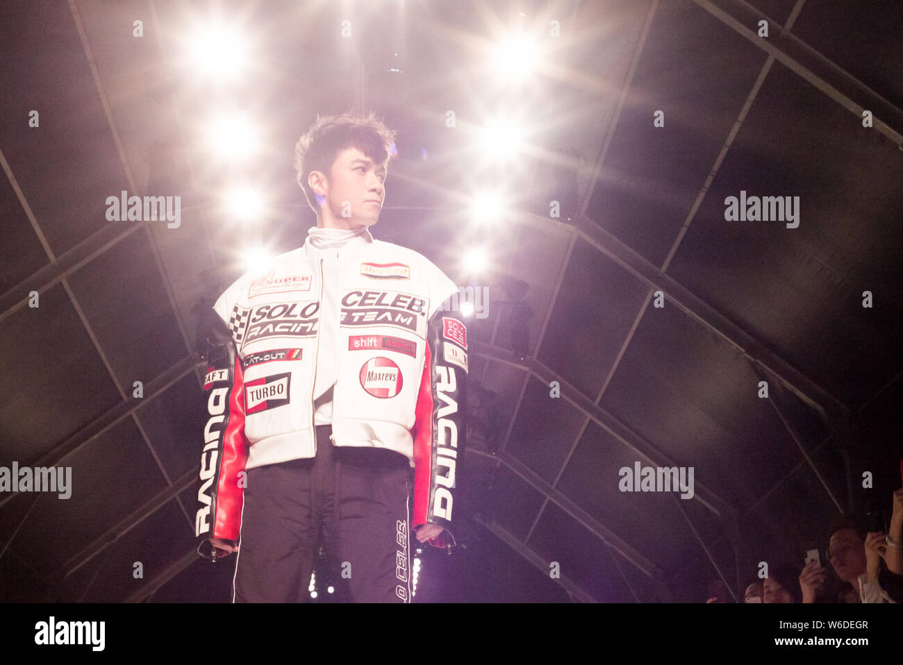 Hong Kong singer, actor and designer Leo Ku displays a new creation at ...